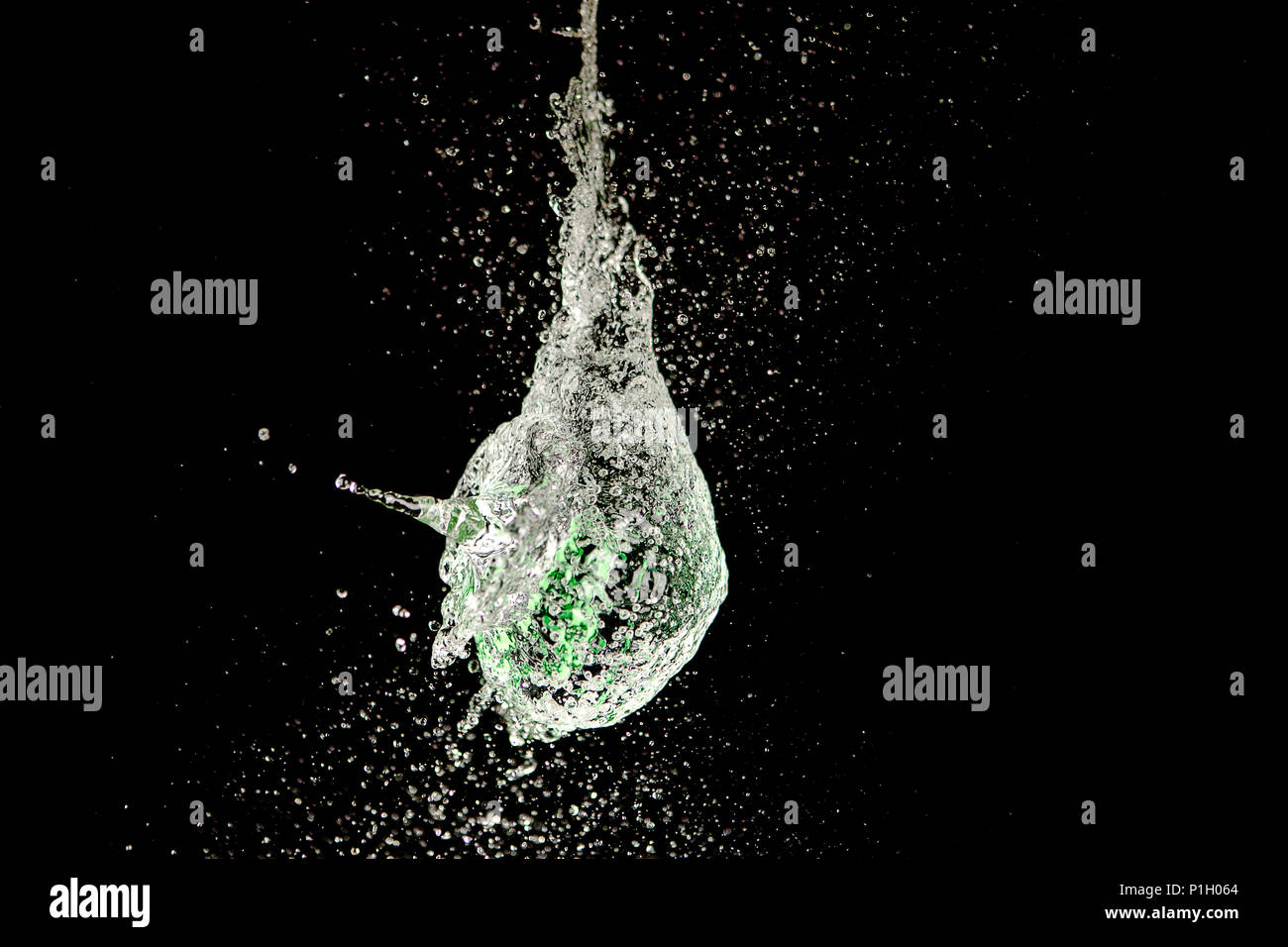 high-speed photograph of a balloon filled with exploding water Stock ...
