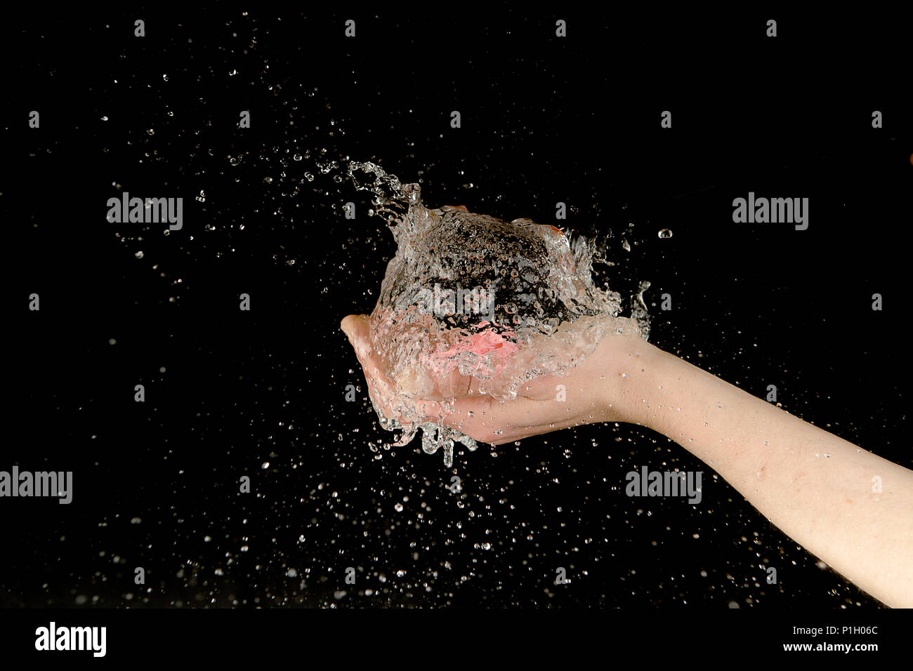 high-speed photograph of a balloon filled with exploding water Stock ...