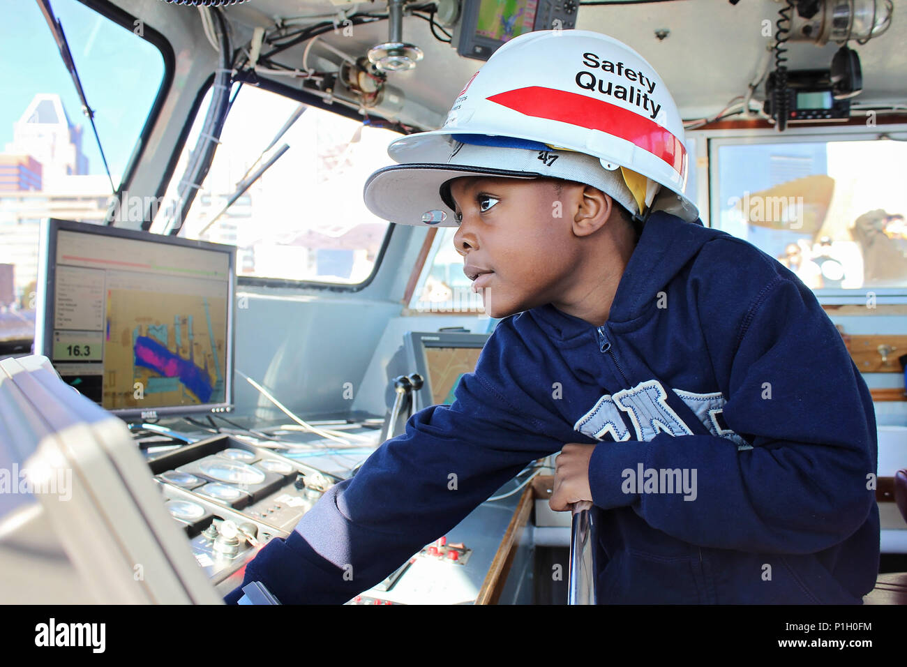 A young boy climbed into the captain's chair and "played" future ...