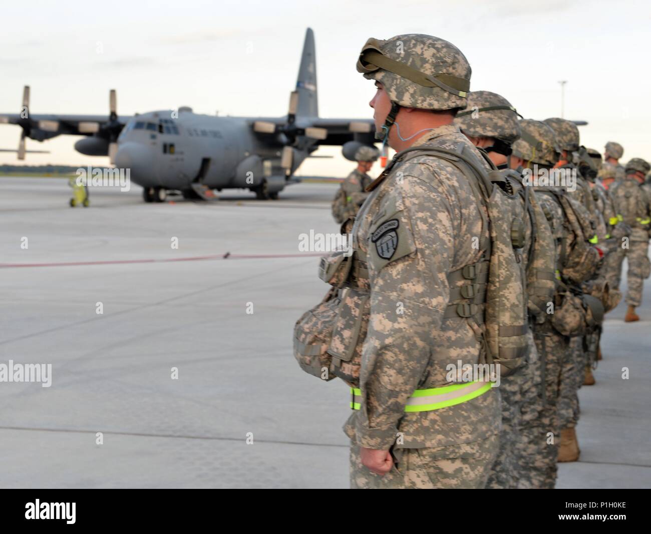 Georgia State Defense Force Soldiers prepare to board a C-130 Hercules ...