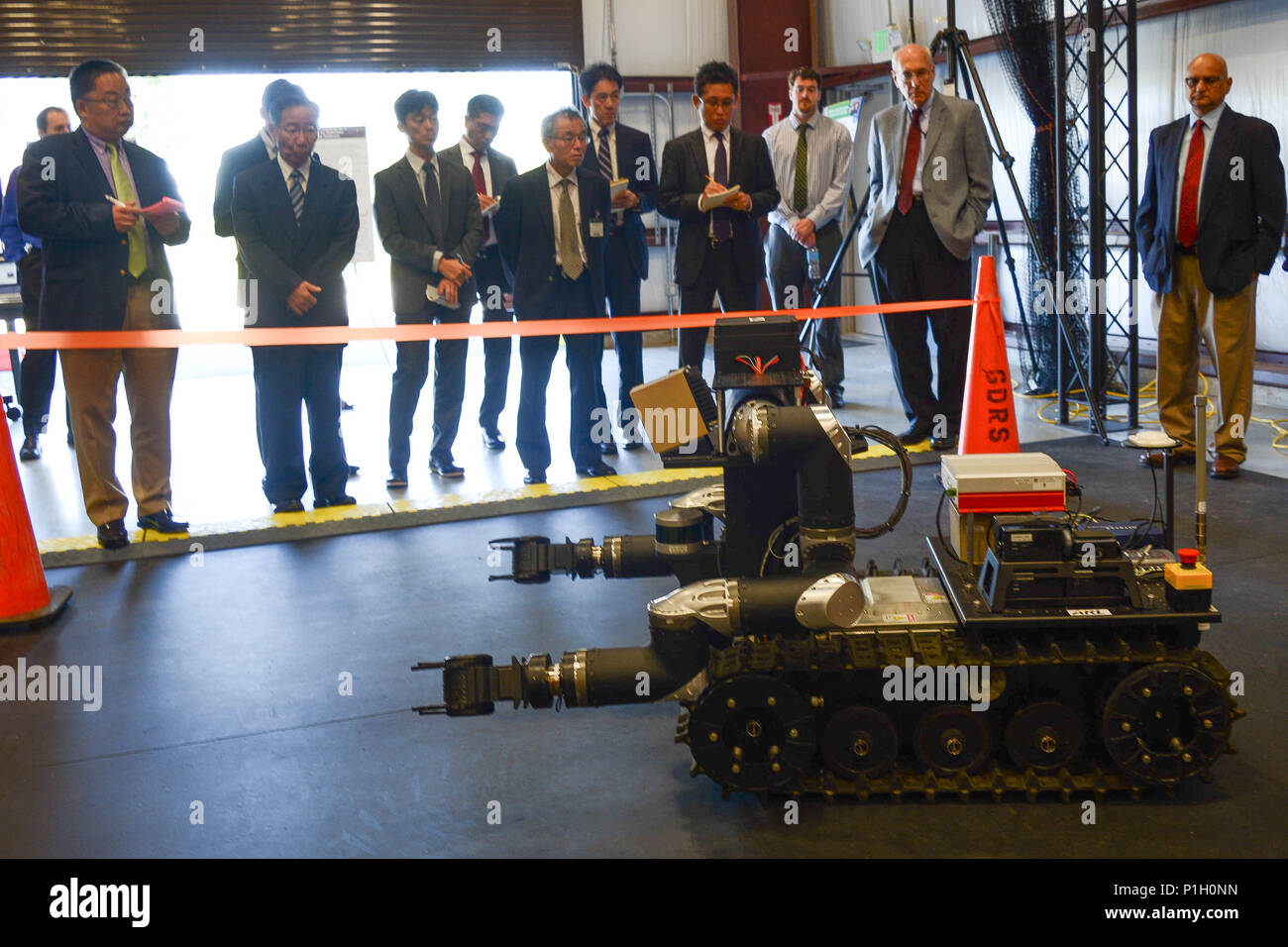Japanese visitors to the U.S. Army Research Laboratory learn about a ...