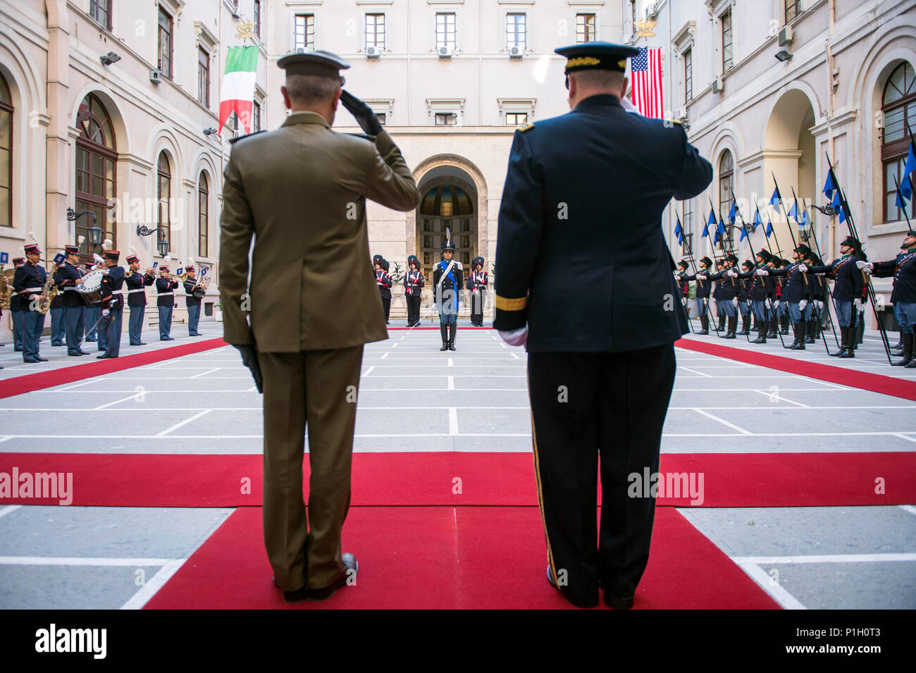 U.S. Army Chief of Staff Gen. Mark A. Milley, right, salutes along with ...