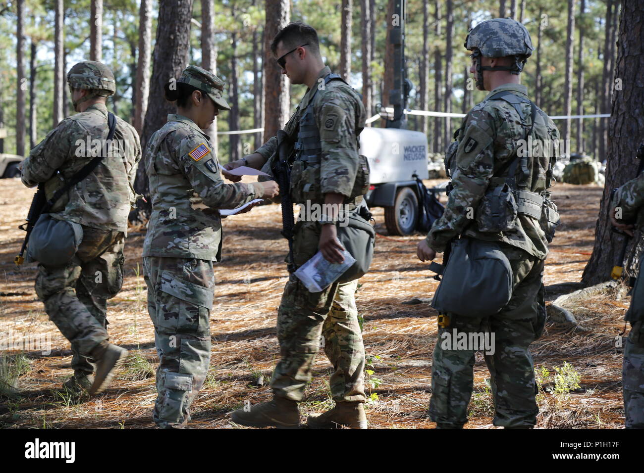 U.S. Army Soldiers receives their score during the Expert Field Medical ...