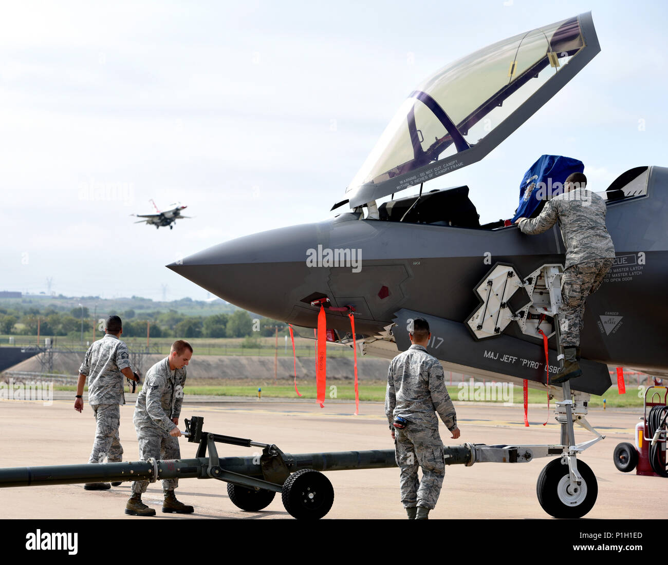 Maintainers from the 33rd Fighter Wing prepare an F-35A Lightning II to ...