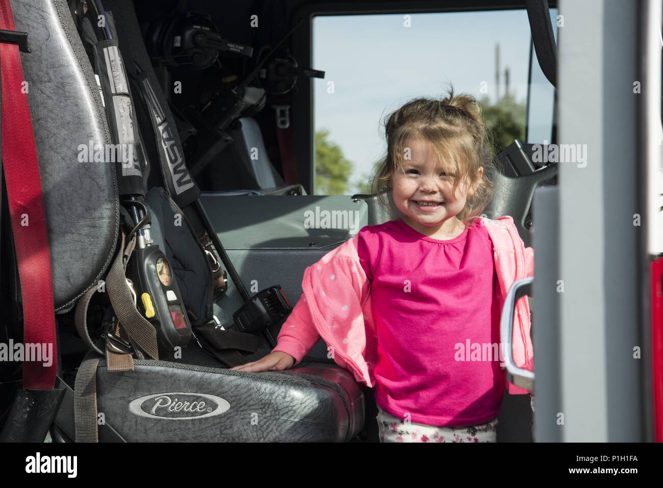 A child smiles for a photo, during fire prevention week, October 14 ...