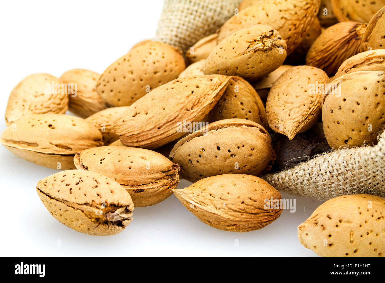 organic almonds inside a rustic bag Stock Photo - Alamy