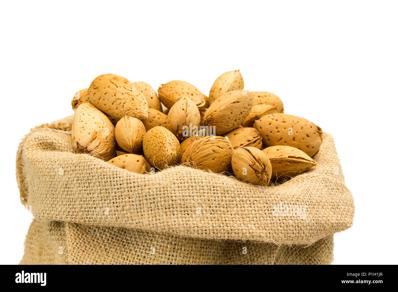 organic almonds inside a rustic bag Stock Photo - Alamy