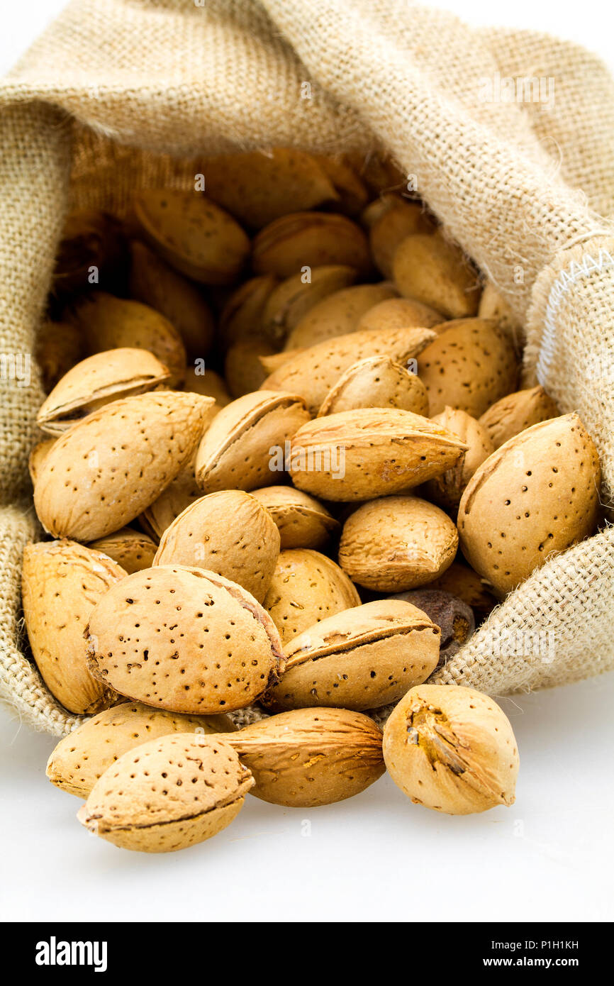 organic almonds inside a rustic bag Stock Photo - Alamy