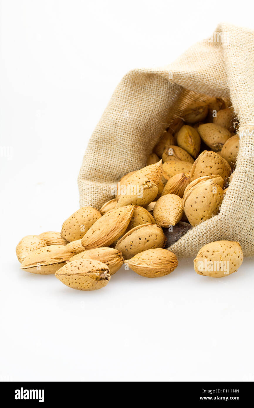 organic almonds inside a rustic bag Stock Photo - Alamy