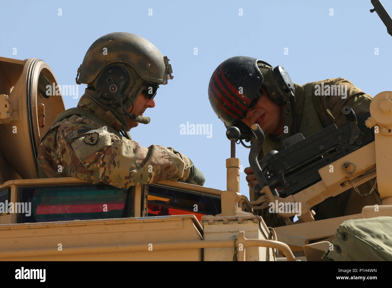 Sgt. Maj. Eric C. Dostie, U.S. Army Central Command, prepares to fire ...