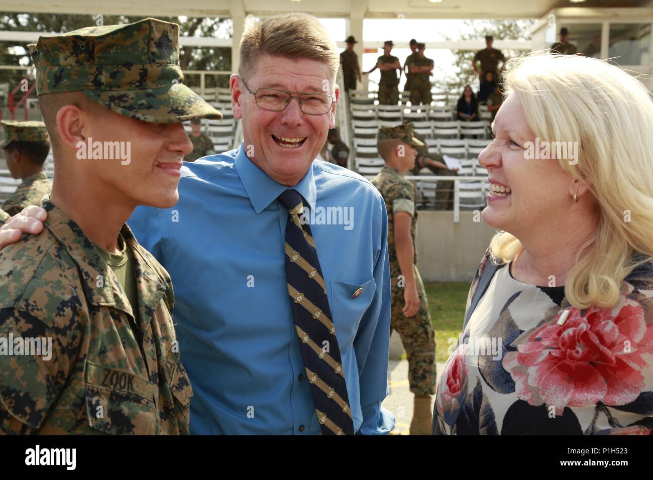 Private Joshua D. Zook reunites with his parents, Mark and Karen Zook ...