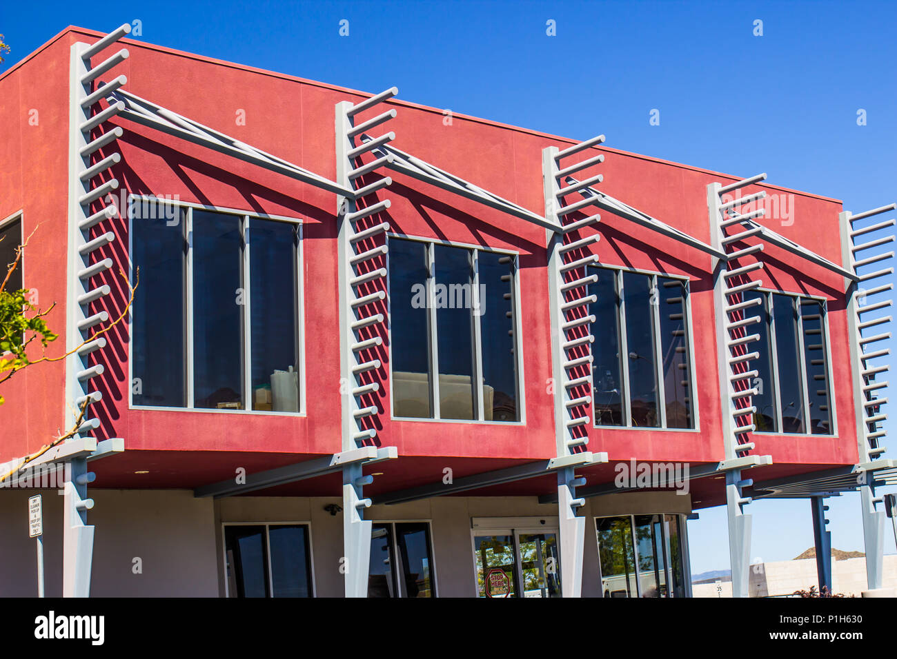 Colorful Two Story Building With Unique Architecture Stock Photo - Alamy