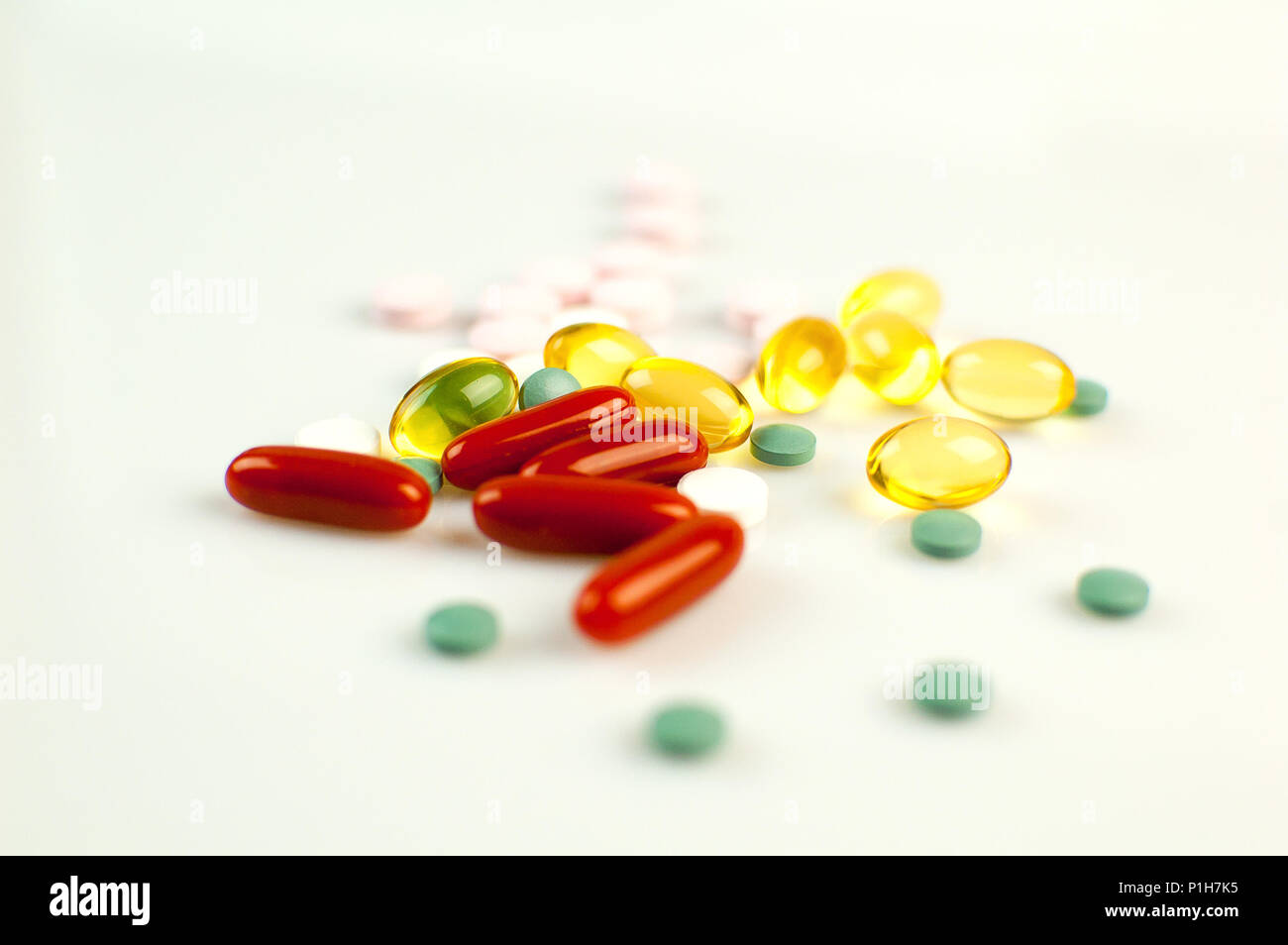 Stack of Different Pills Isolated on White Background. Pharmacy Concept ...