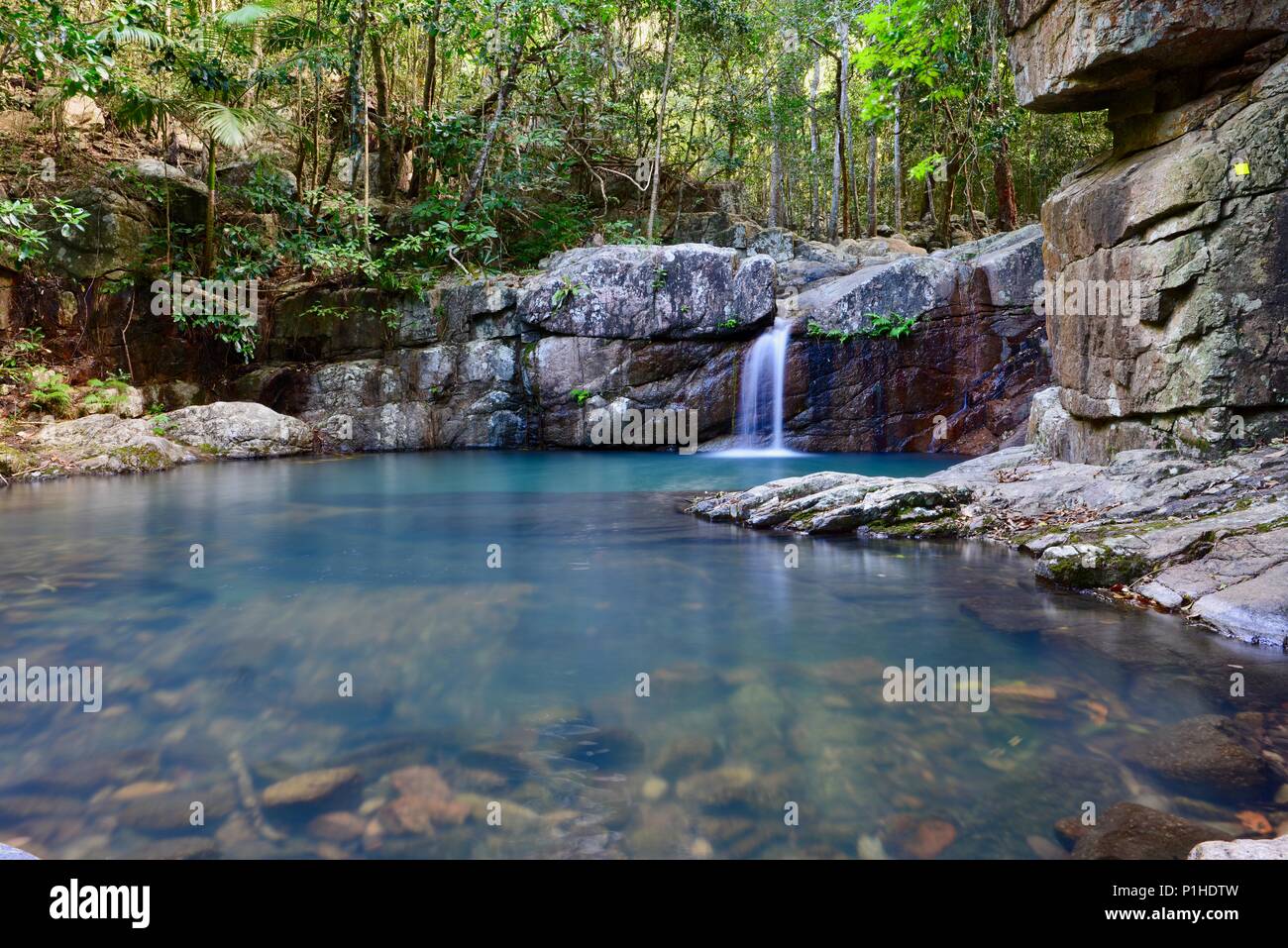 Tranquil blue waters of Rope falls, Paluma Range National Park ...