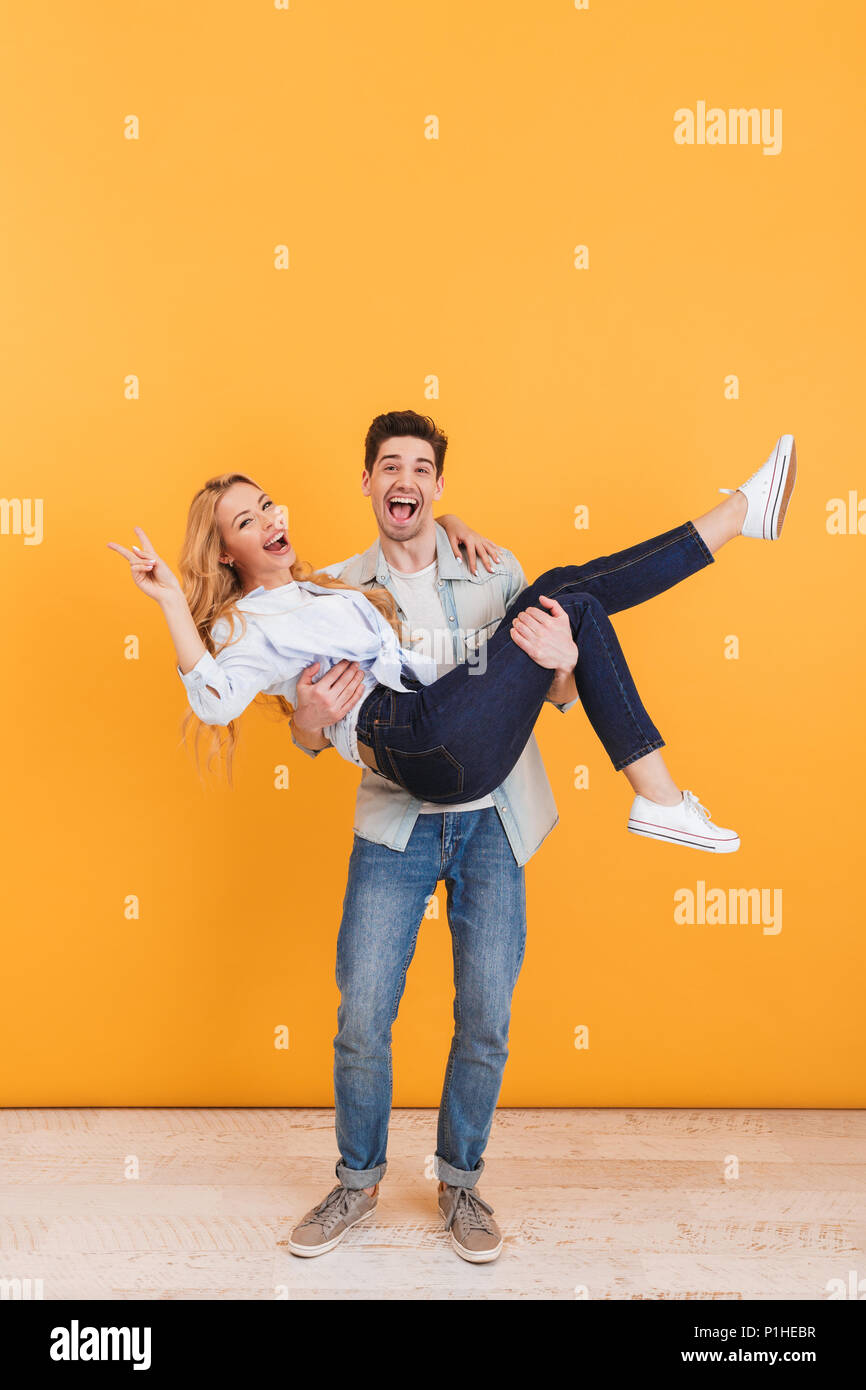 Guy holding girlfriend in arms hi-res stock photography and images - Alamy