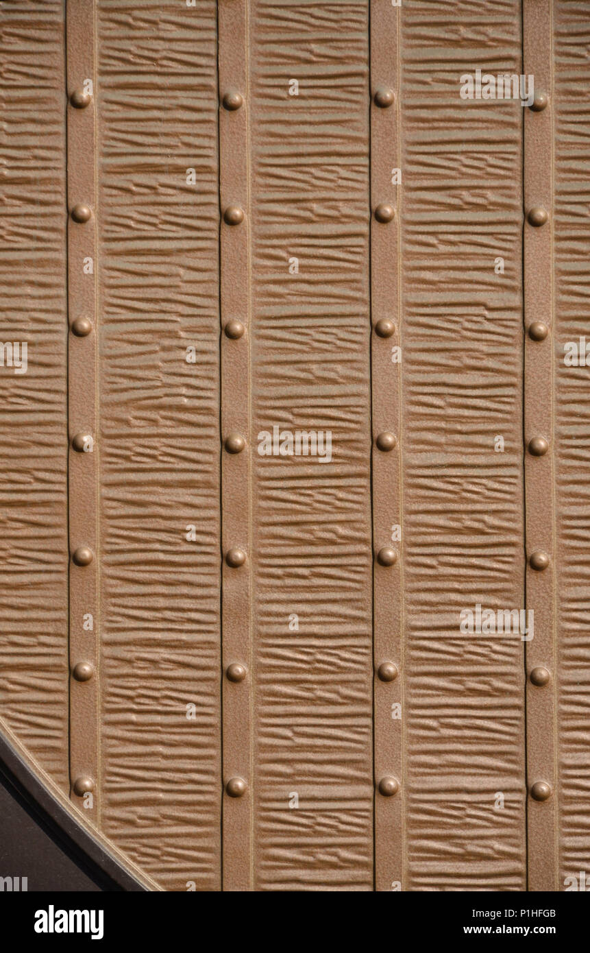 The texture of the fragment of the ancient bronze gate Stock Photo - Alamy