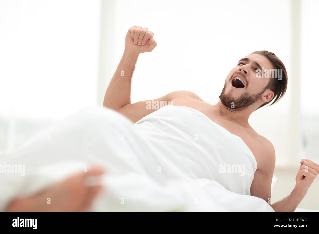 happy man waking up in the morning Stock Photo - Alamy
