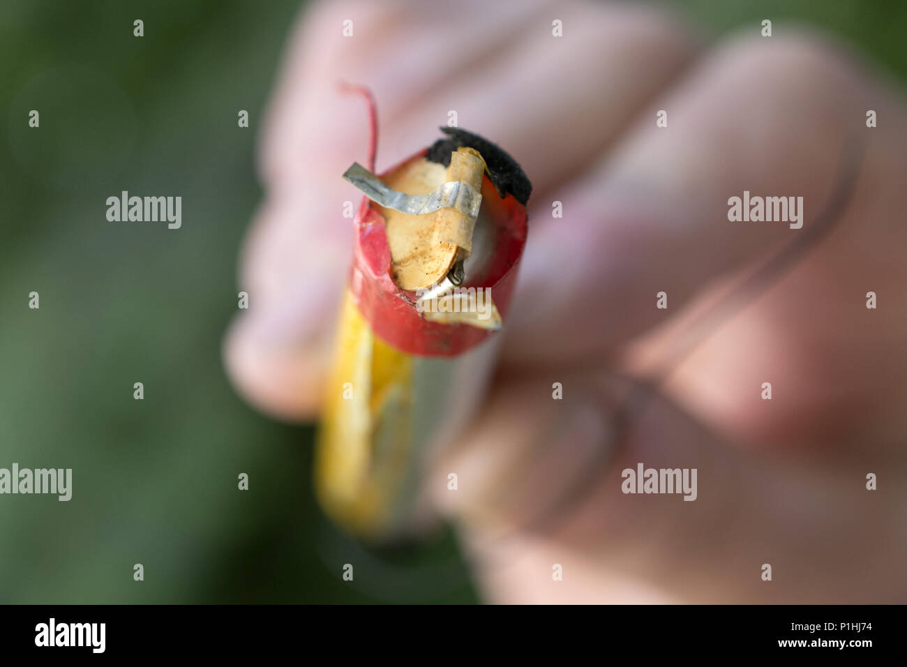 hand holding used battery of device,image of a Stock Photo - Alamy