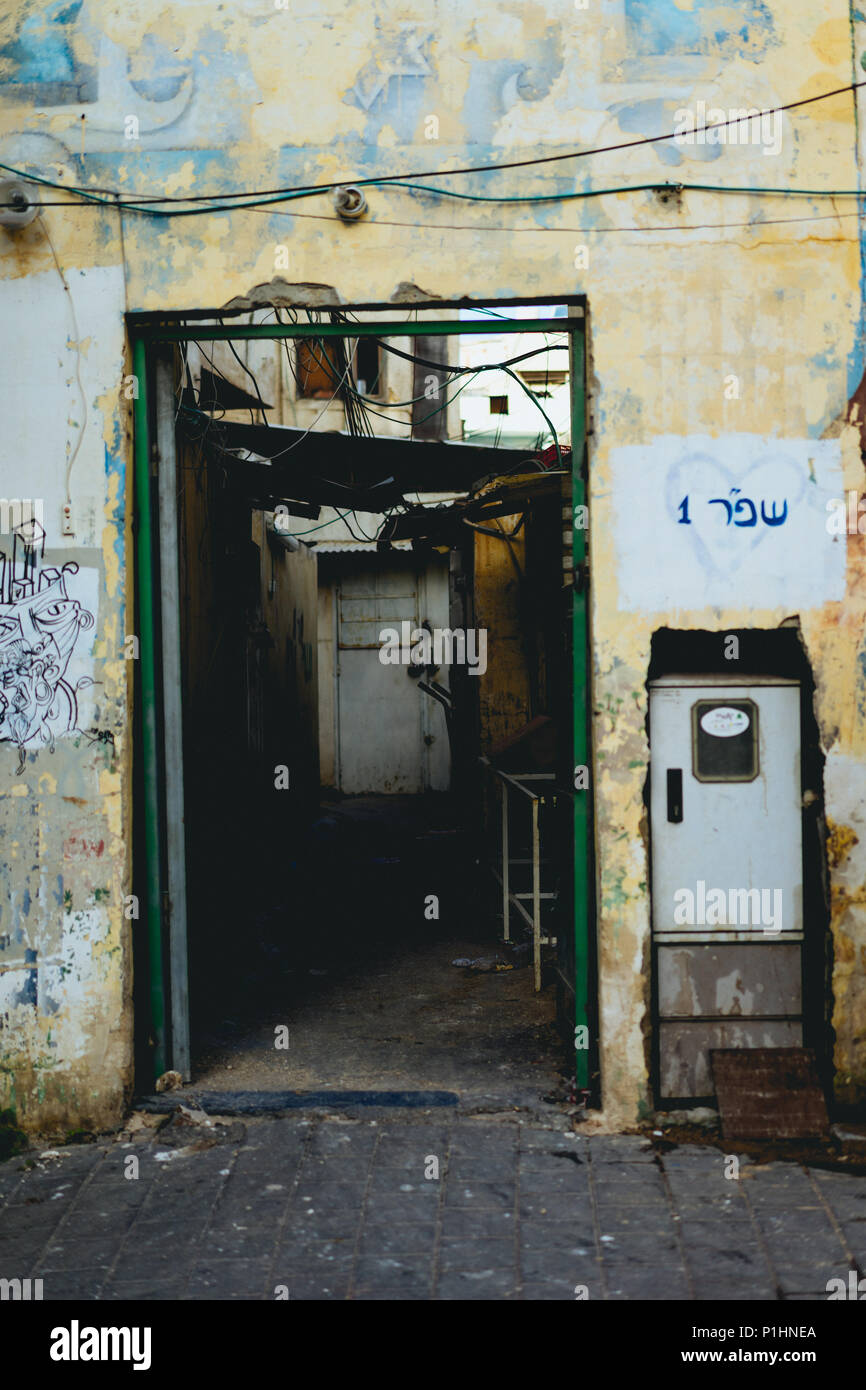 Building behind a wall with graffiti hi-res stock photography and ...