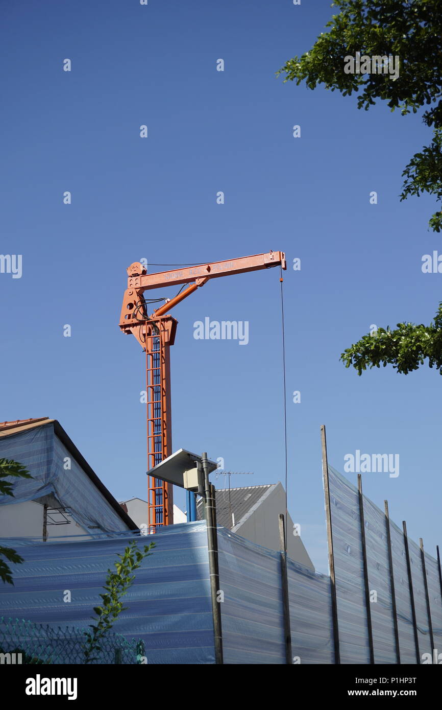 piling machine against blue sky Stock Photo - Alamy