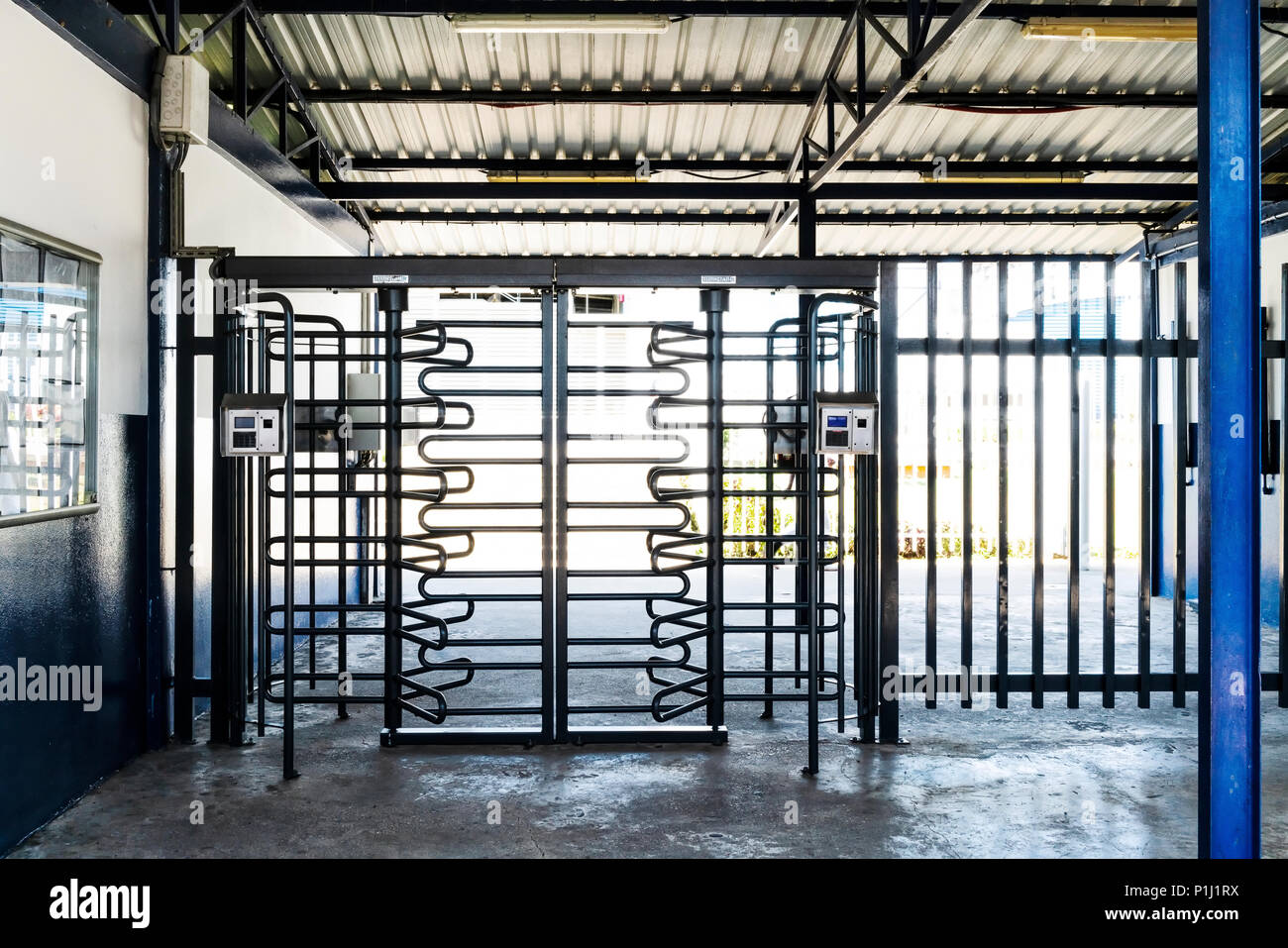Factory entry for employees Stock Photo - Alamy
