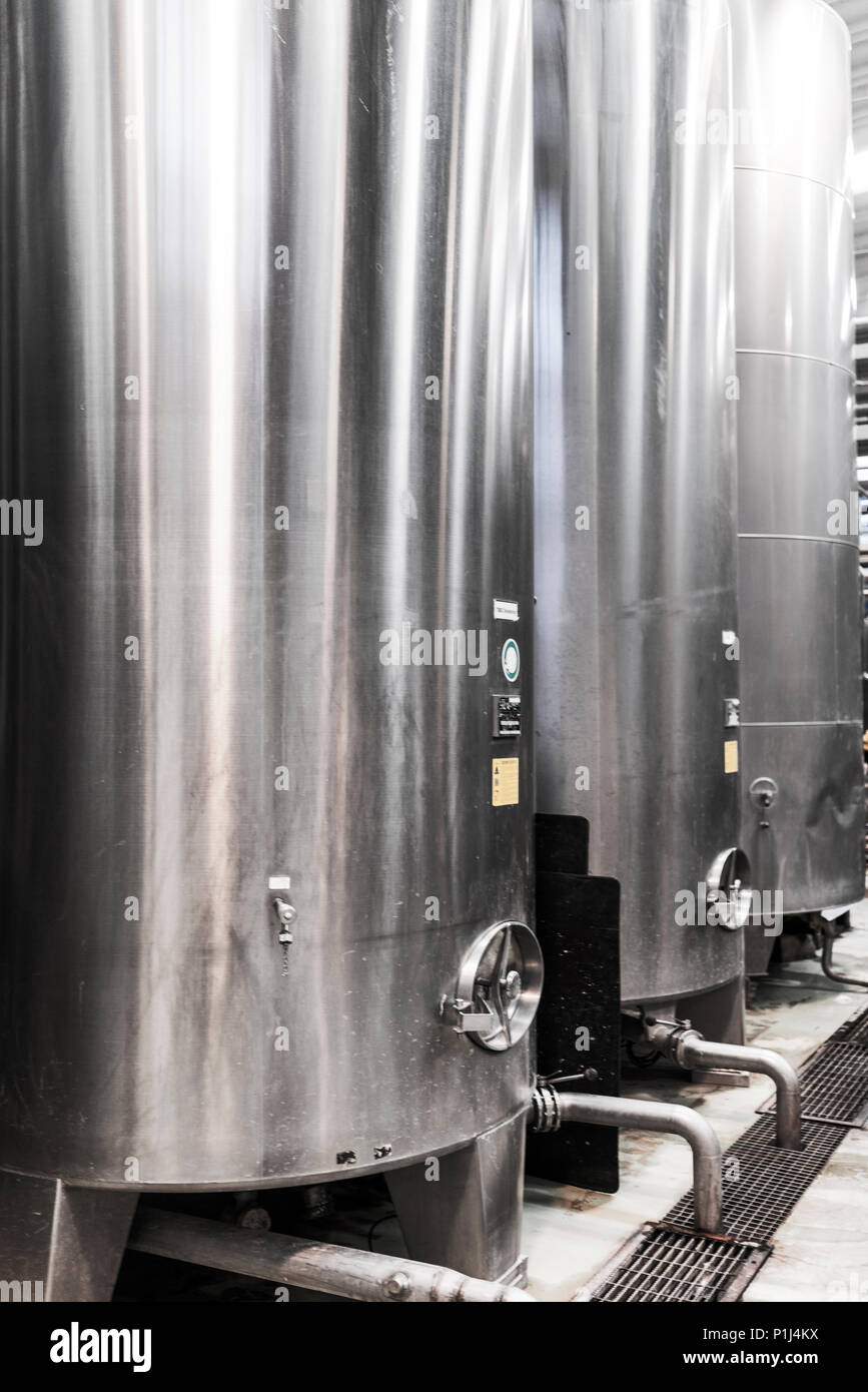 Indoor Beverage factory cylinders Stock Photo - Alamy