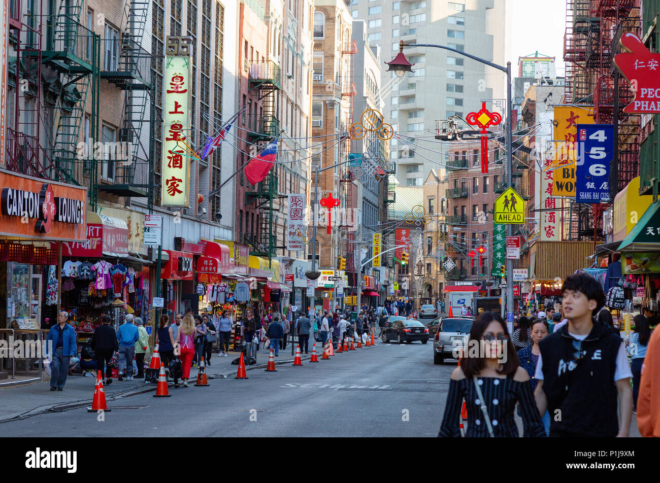 Street scene with pedestrians, Chinatown New York city, United States ...