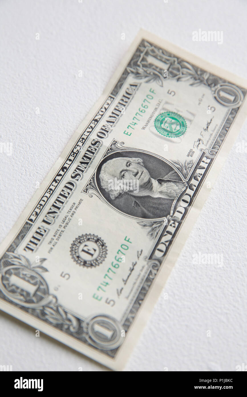 A one dollar note on a white background Stock Photo - Alamy