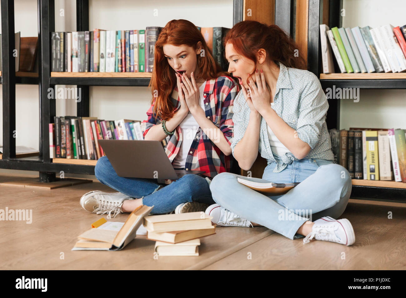Women shocked book hi-res stock photography and images - Alamy