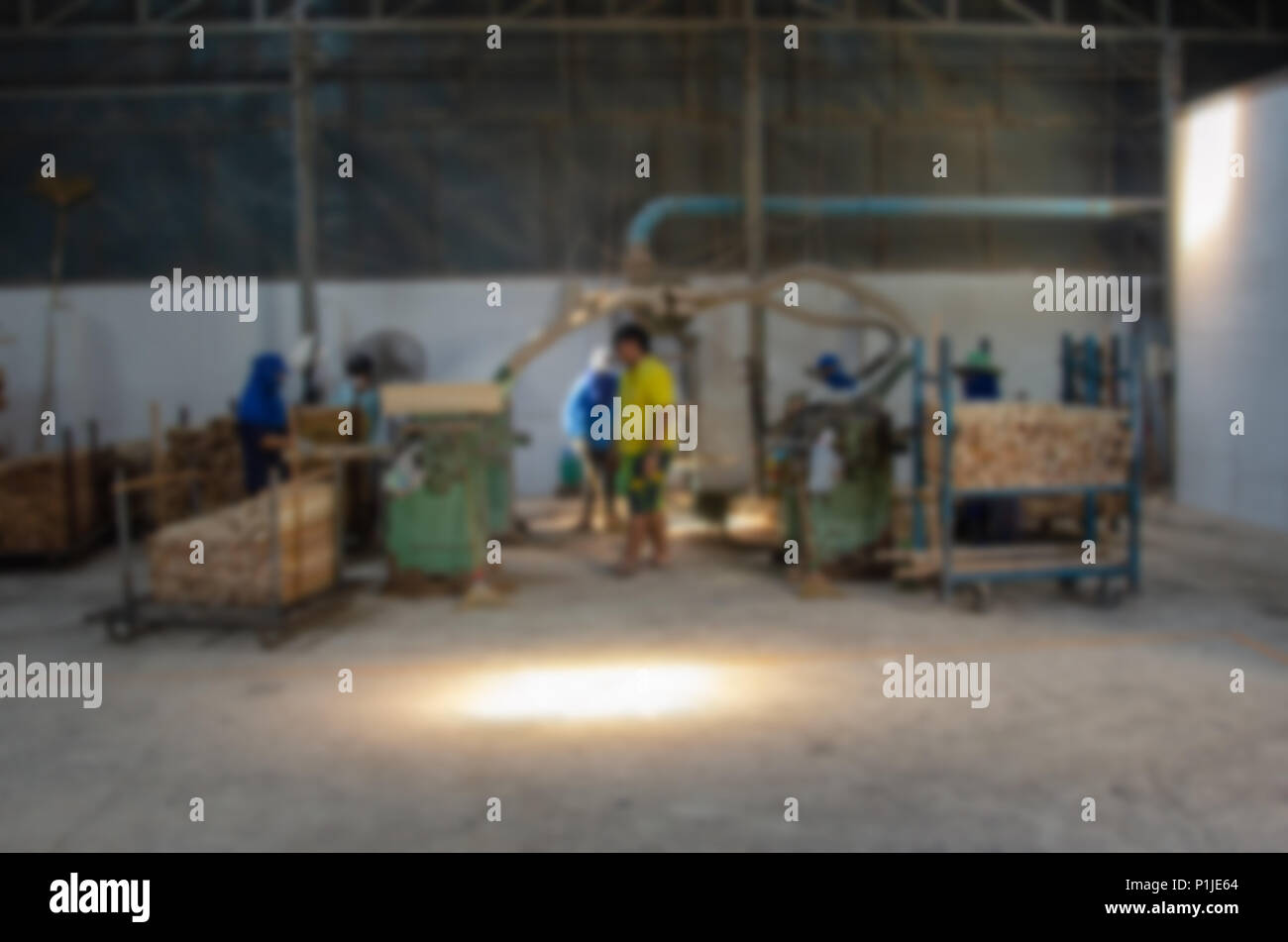 People working in wood factory Furniture, background blur Stock Photo ...