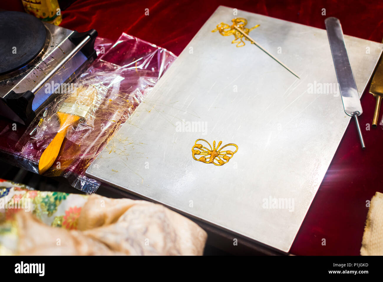 Asian man making candy hi-res stock photography and images - Alamy