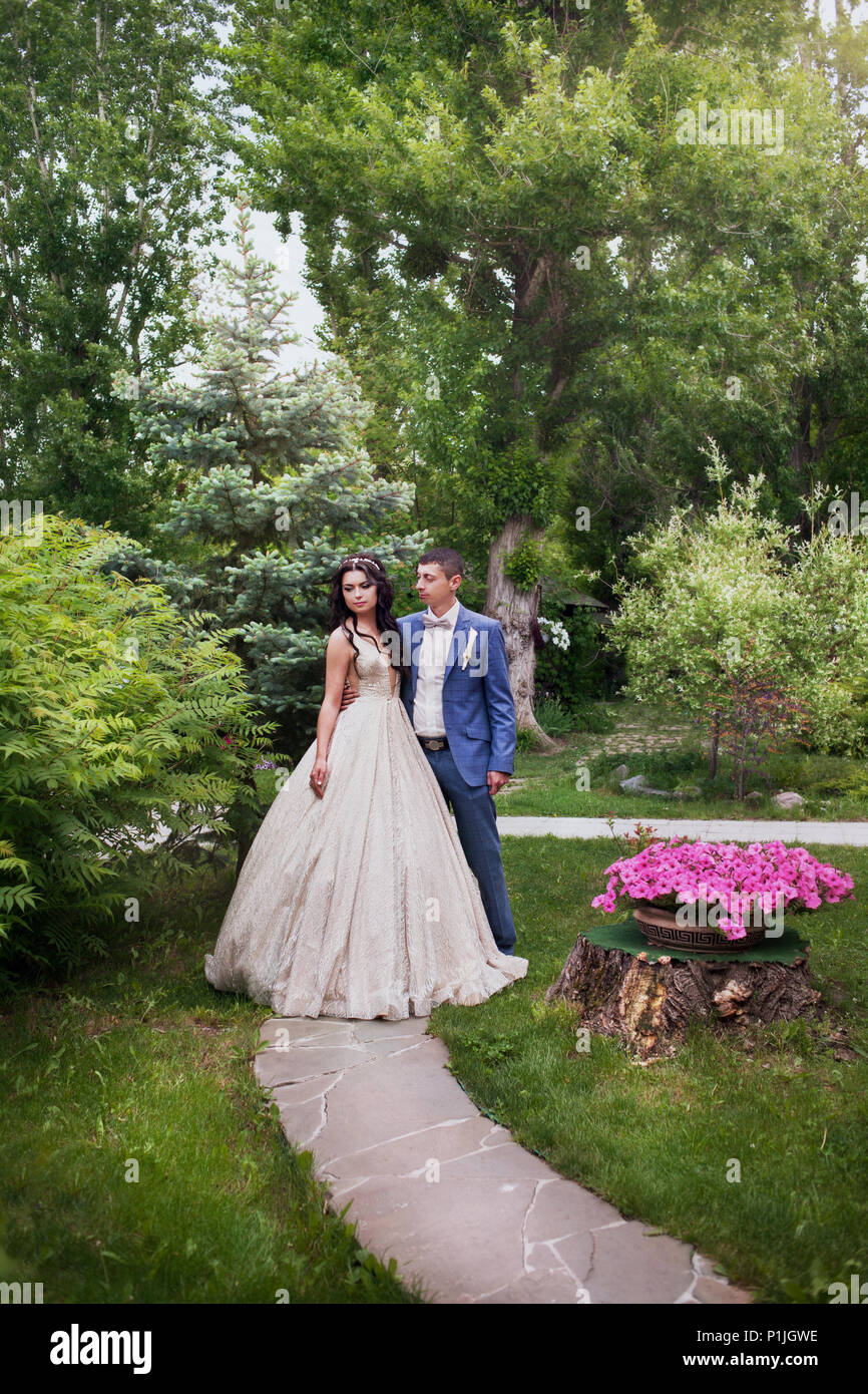 beautiful happy young bride and groom celebrating wedding outdoor Stock ...