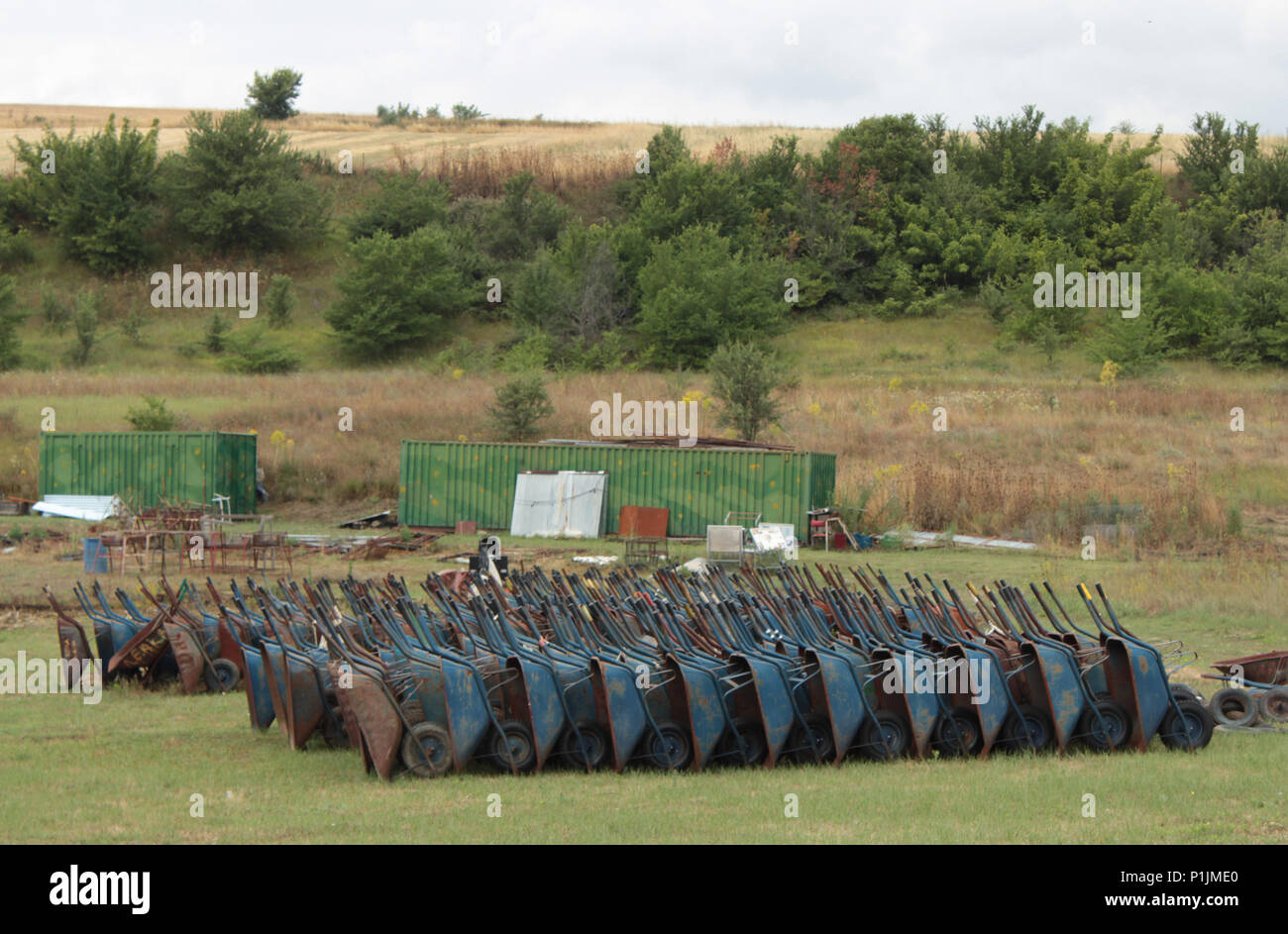 Wheelbarrow in a field hi-res stock photography and images - Alamy