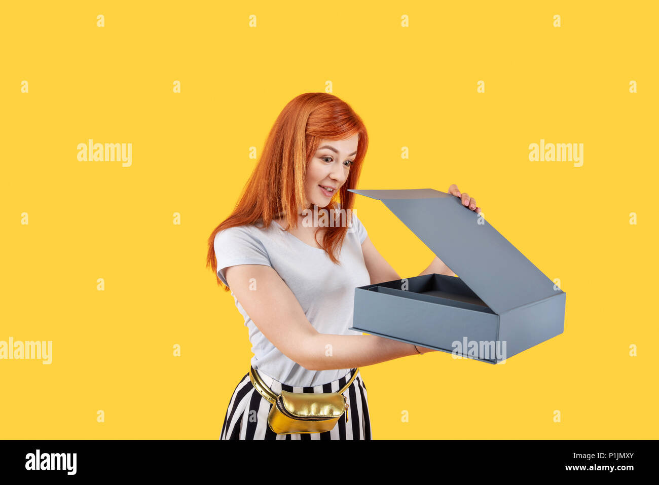 Cheerful gorgeous model holding hi-res stock photography and images - Alamy