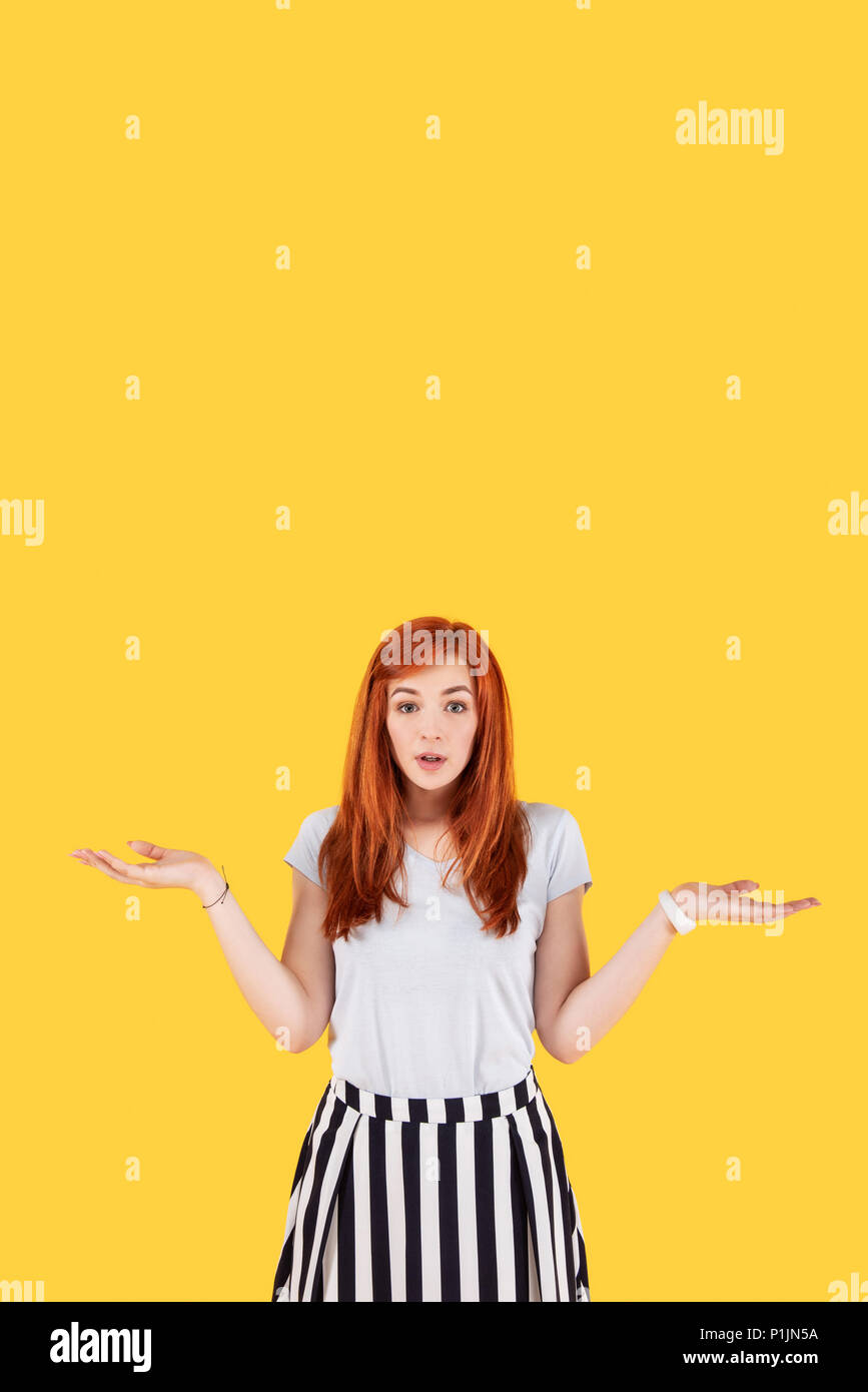 Serious young woman making a choice Stock Photo - Alamy