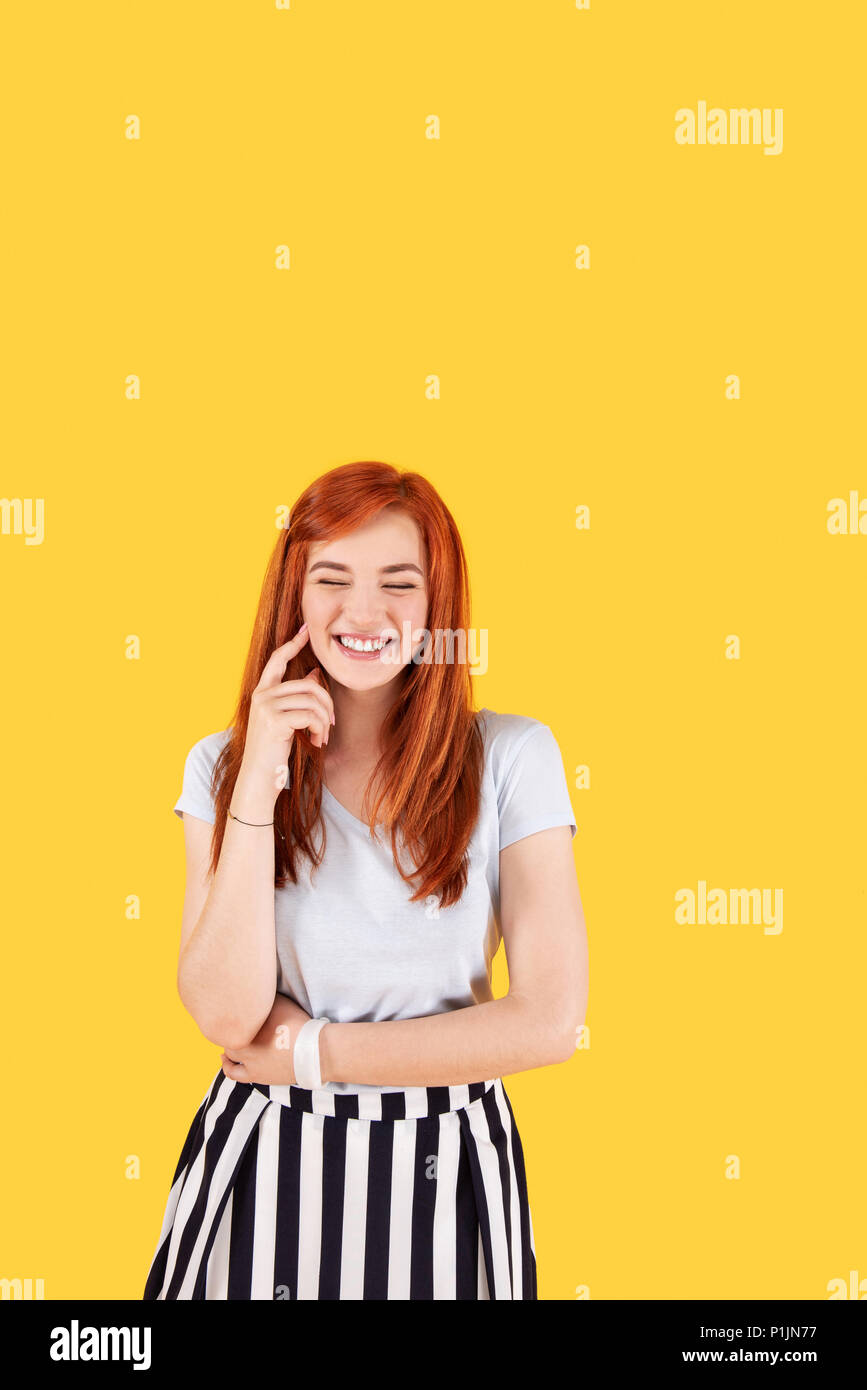 Happy cheerful woman smiling Stock Photo - Alamy