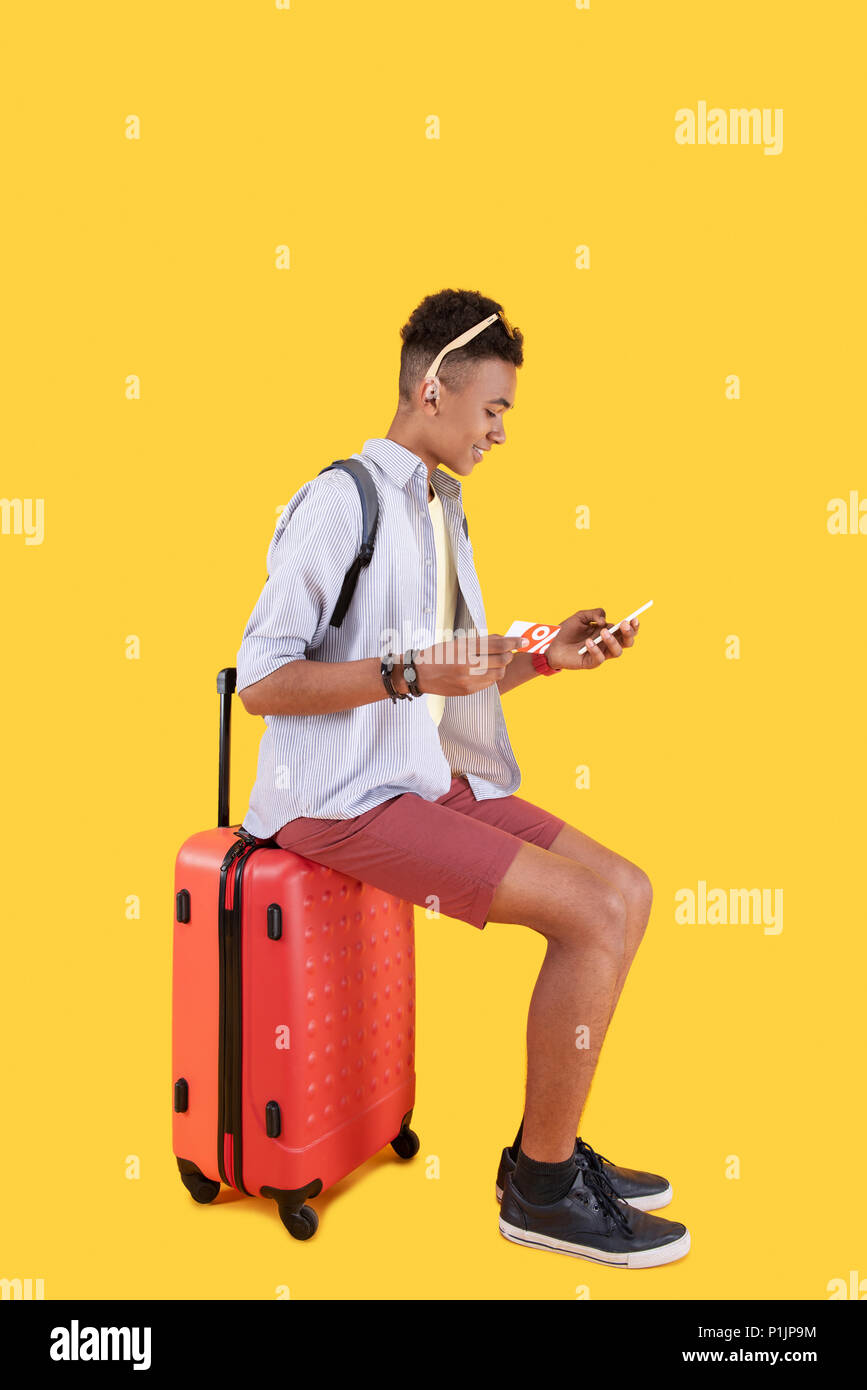 Positive joyful man waiting for the flight Stock Photo - Alamy