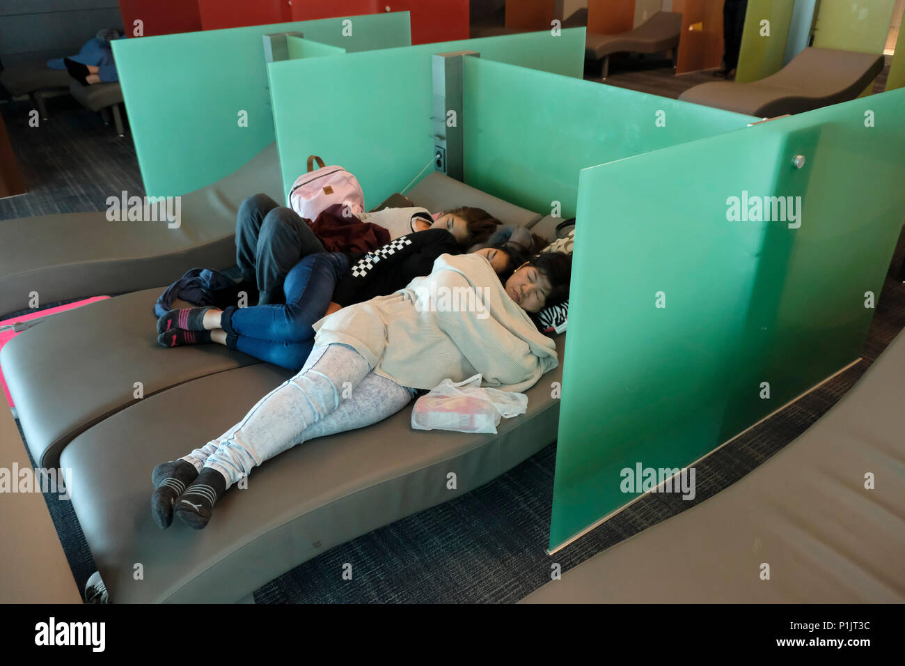Passengers rest at the nap zone at terminal 2 of Incheon International ...