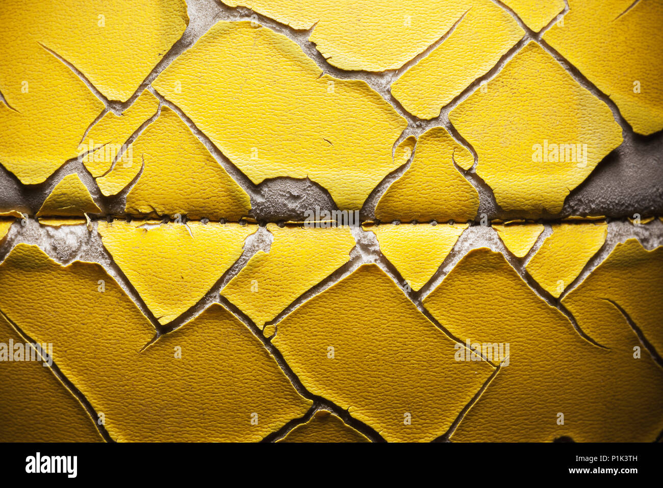 Closeup view on details of an old and damaged volleyball ball Stock ...