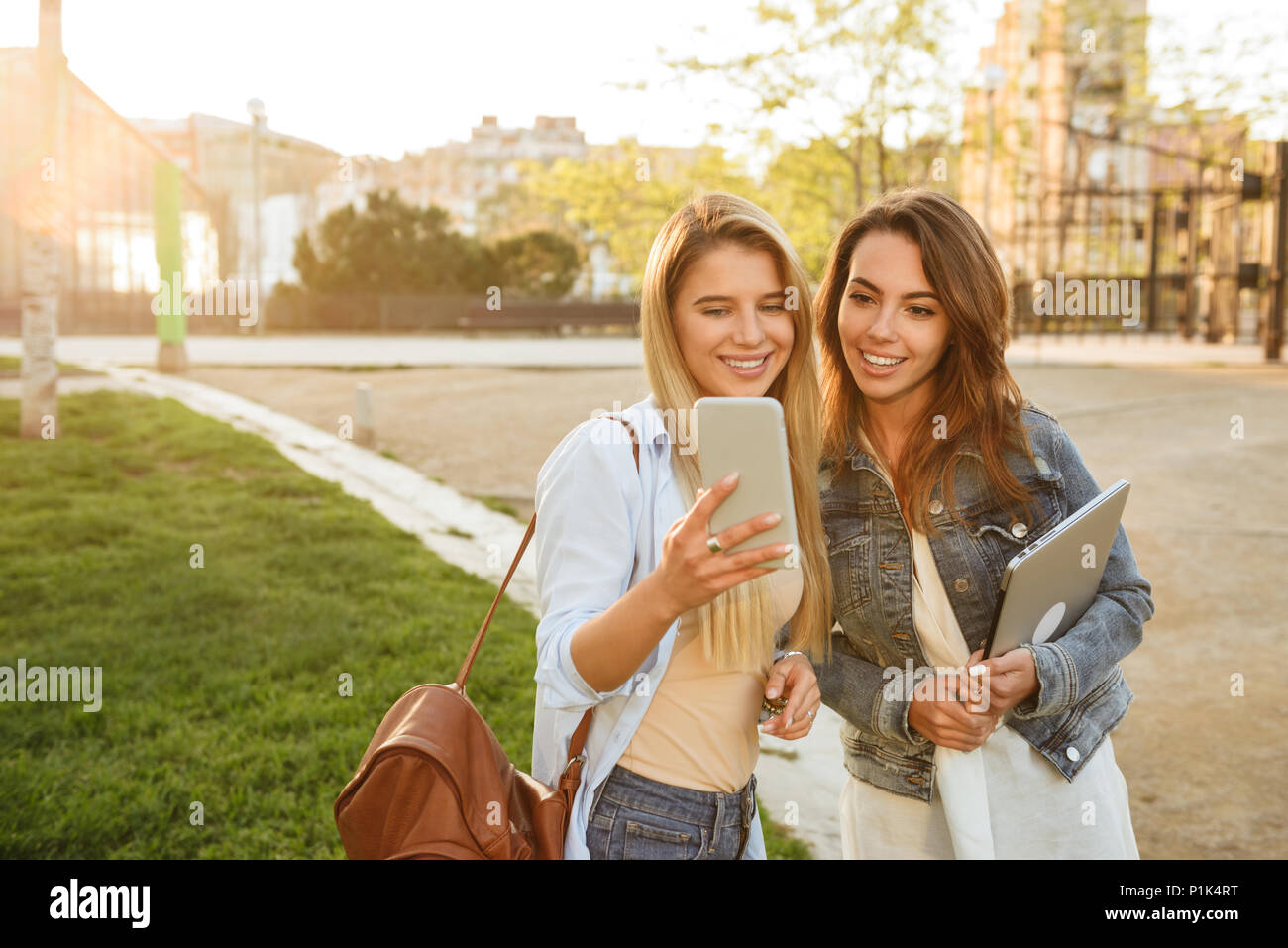 Two women touching each other hi-res stock photography and images - Alamy
