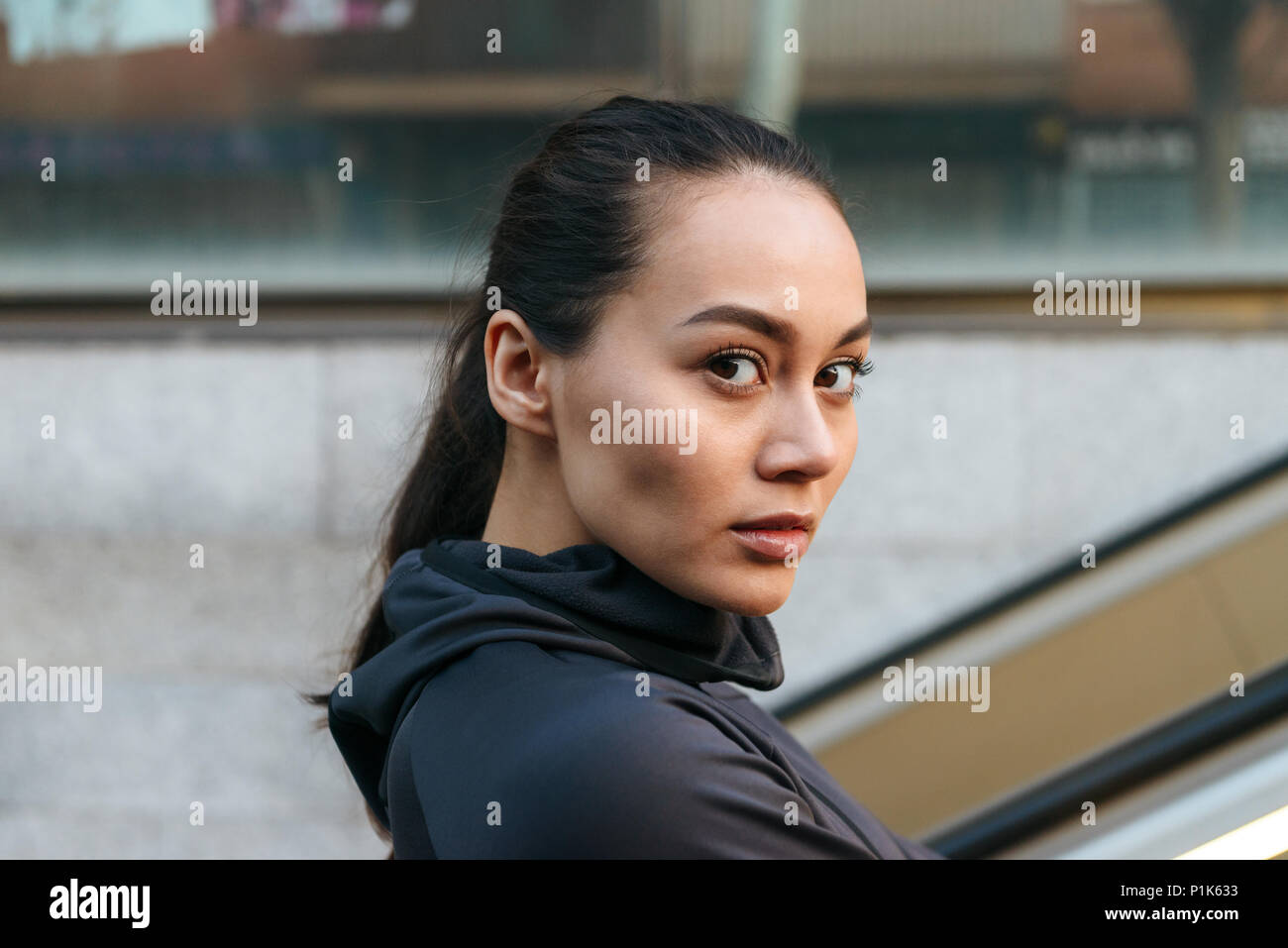 Image of amazing young asian sports woman runner outdoors looking ...