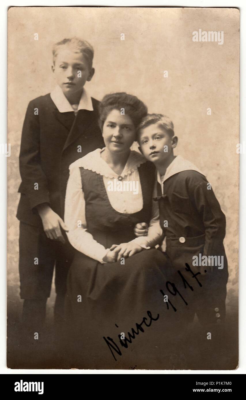 PRAGUE, AUSTRIA-HUNGARY - CHRISTMAS, 1917: Vintage photo shows mother ...