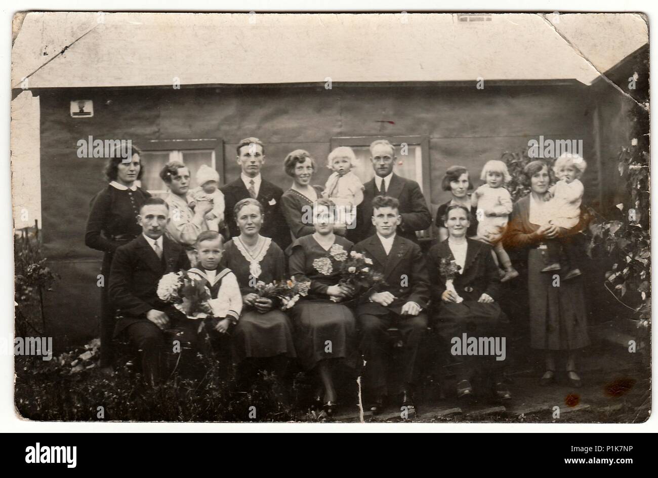 GERMANY - CIRCA 1940s: Vintage photo shows a big family poses behind ...