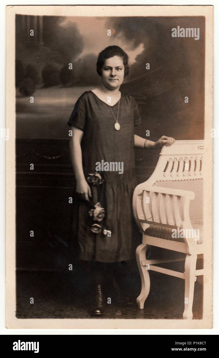 EILENBURG, GERMANY - CIRCA 1930s: Vintage photo shows young woman poses ...