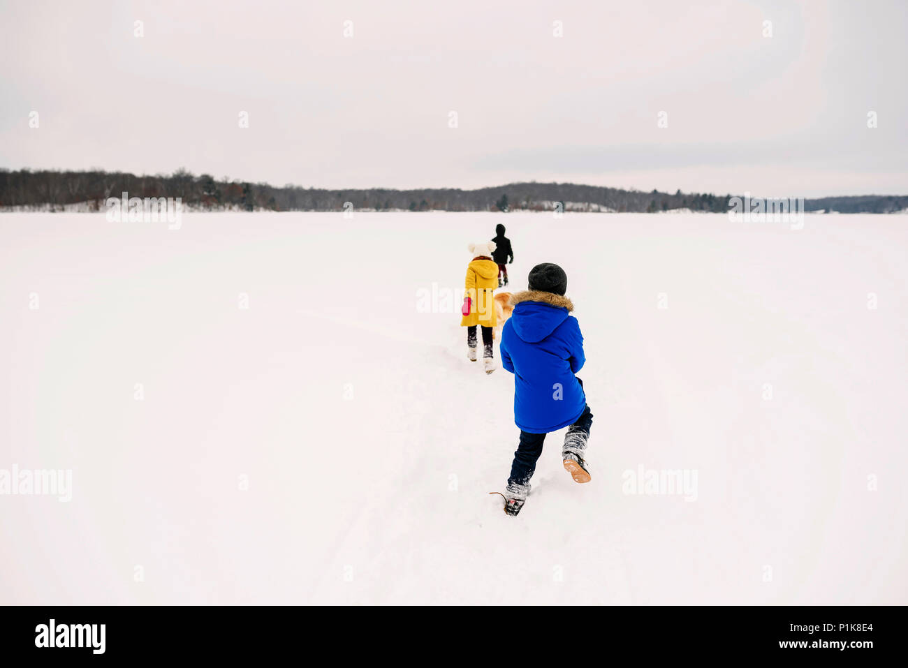 Boy walking on frozen hi-res stock photography and images - Alamy