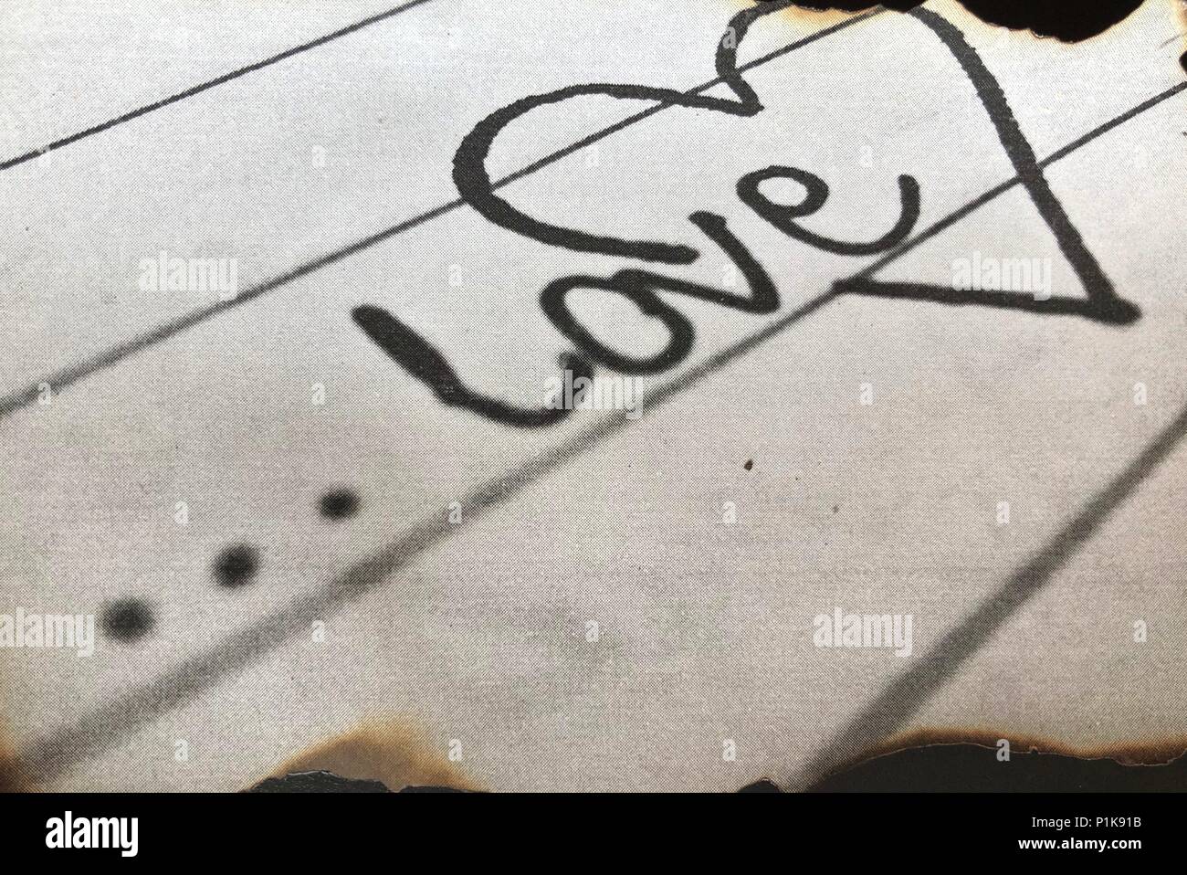 Close-up of the word love and a heart shape Stock Photo - Alamy