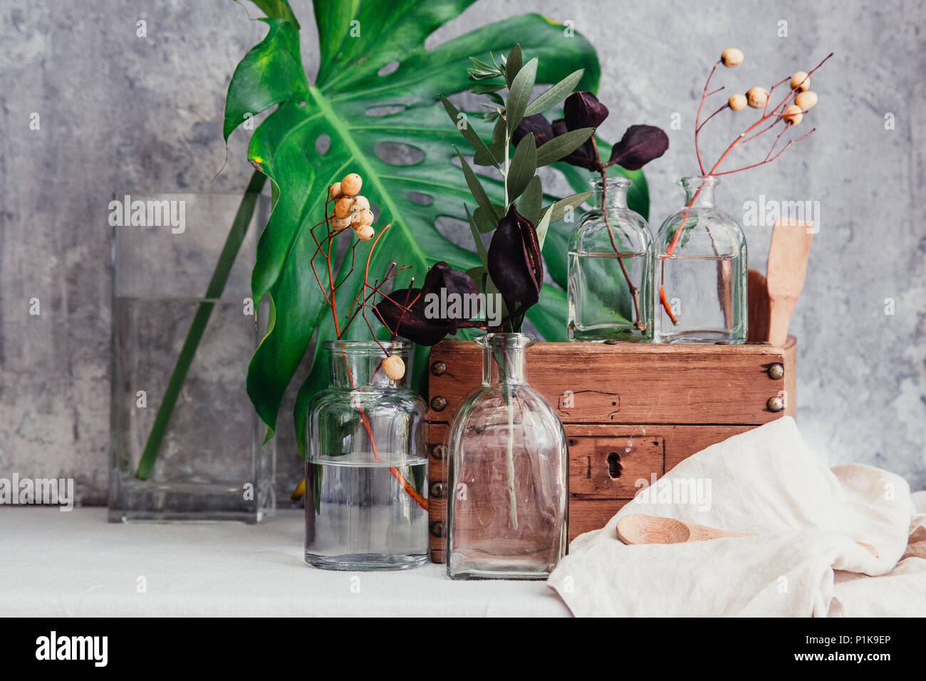 Rustic wooden box with glass vases and plants Stock Photo - Alamy
