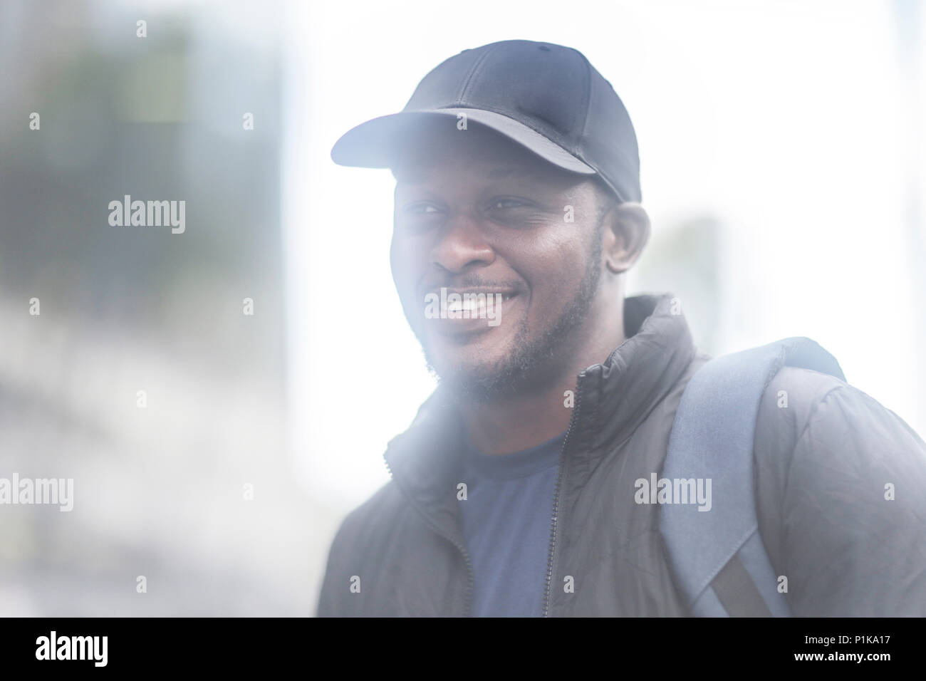 Wearing a baseball cap hi-res stock photography and images - Alamy