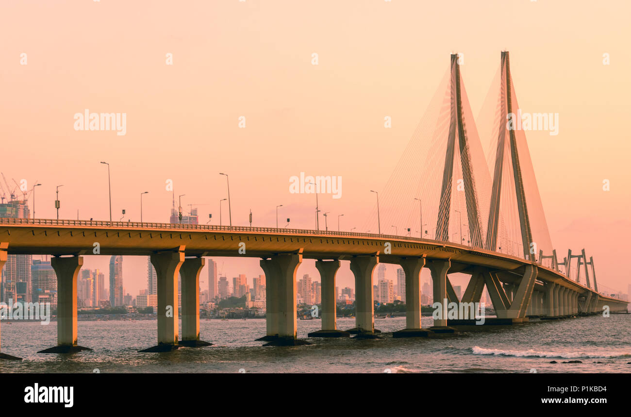A sunset at Bandra Worli Sea link in Mumbai, India. It is a cable ...