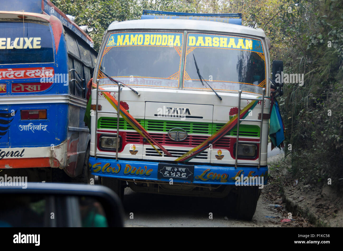 Buses passing each other on narrow mountain road, Rural traffic jam ...